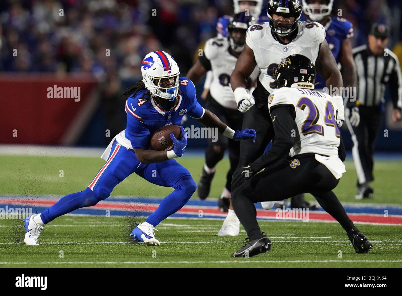Buffalo Bills running back James Cook (4) runs against Baltimore Ravens ...