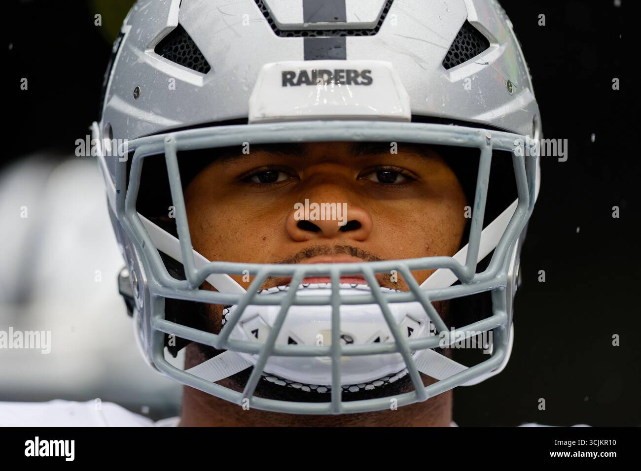 Las Vegas Raiders defensive tackle Jonah Laulu (96) reacts prior to an ...