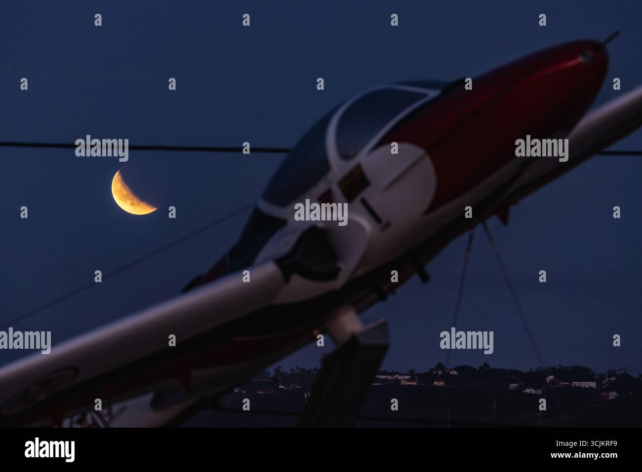 A red full moon, also known as a blood moon, is seen during a lunar ...