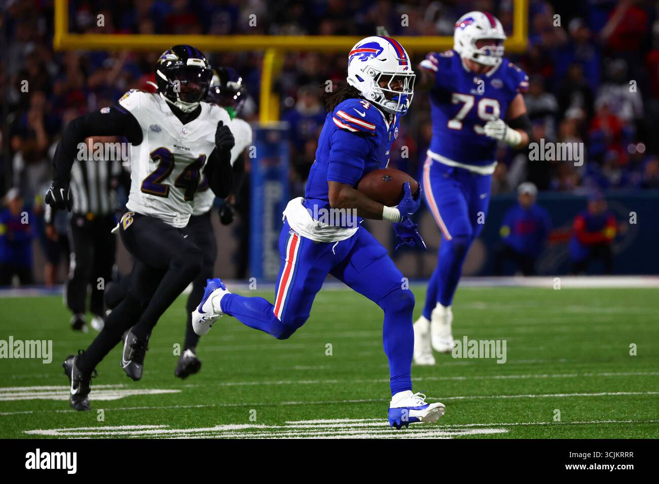 Buffalo Bills running back James Cook (4) runs against the Baltimore ...