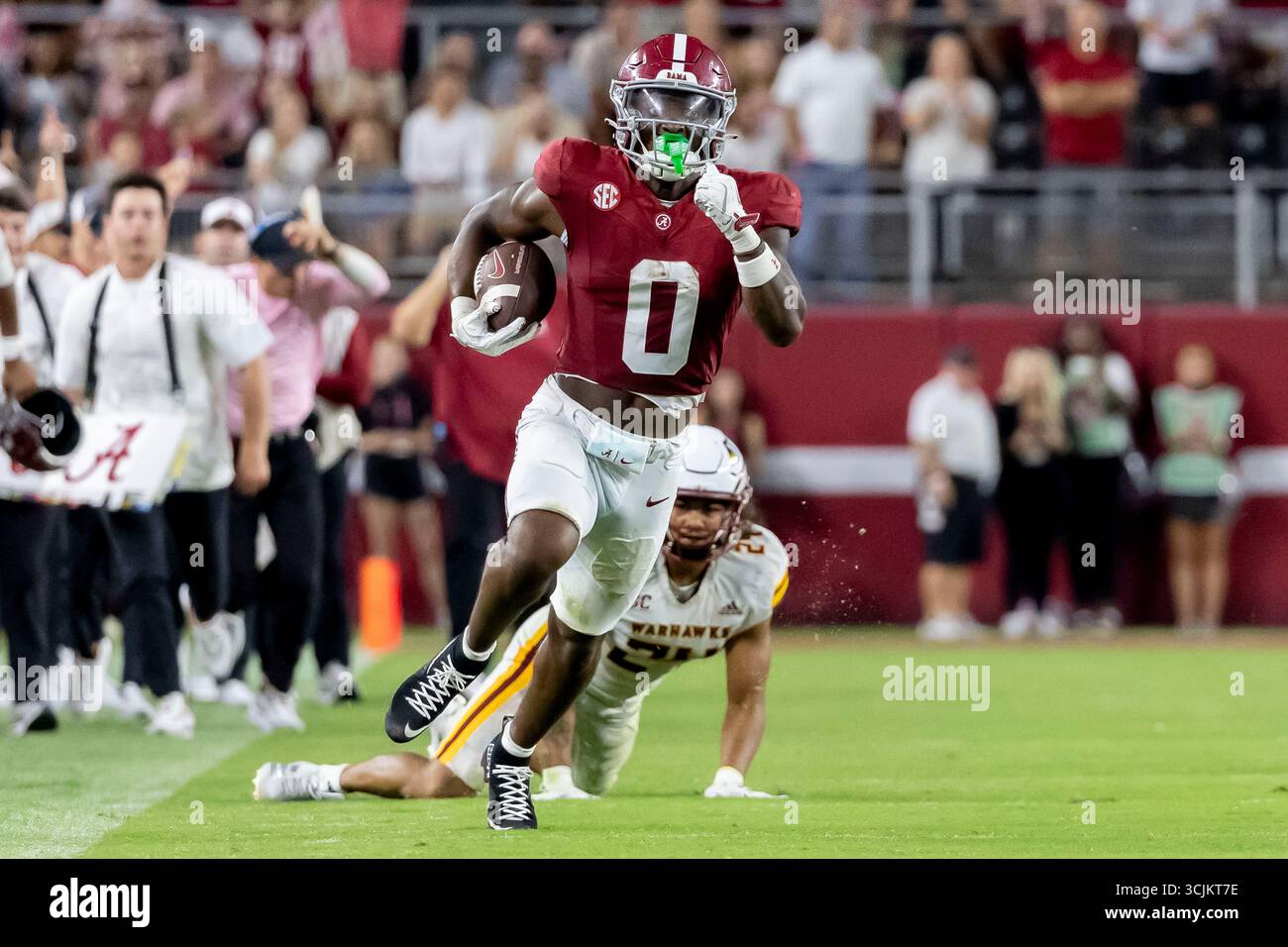 Alabama running back AK Dear (0) runs the ball for a 56-yard touchdown ...