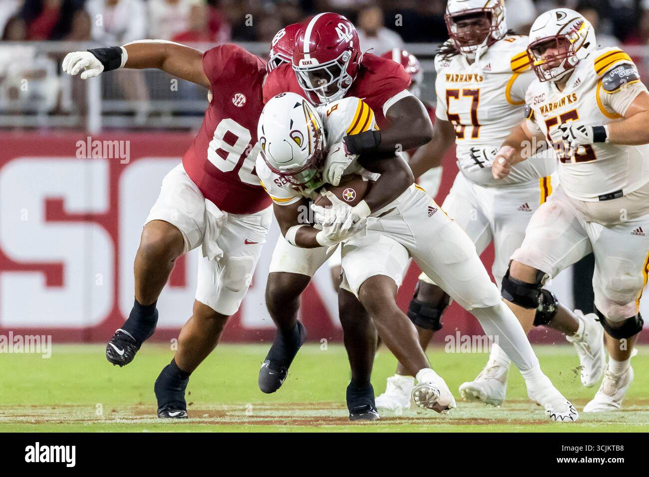 Alabama linebacker Yhonzae Pierre (42) stops Louisiana-Monroe running ...