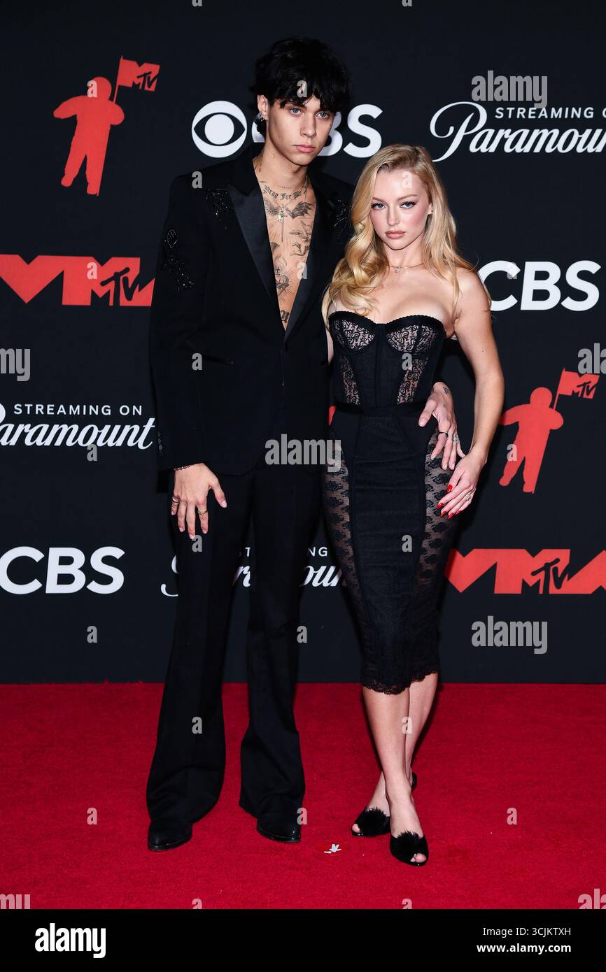 Landon Barker and Skyla Sanders walking on the red carpet at the 2025 ...