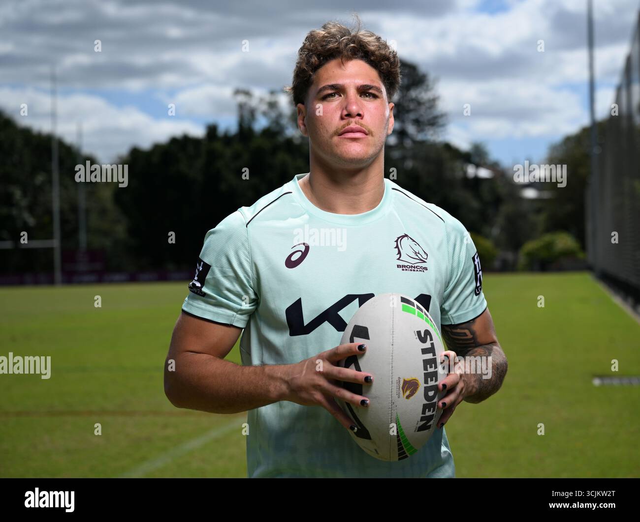 Reece Walsh of the Brisbane Broncos is seen posing for a photograph ...