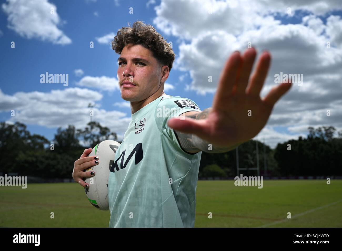 Reece Walsh of the Brisbane Broncos is seen posing for a photograph ...