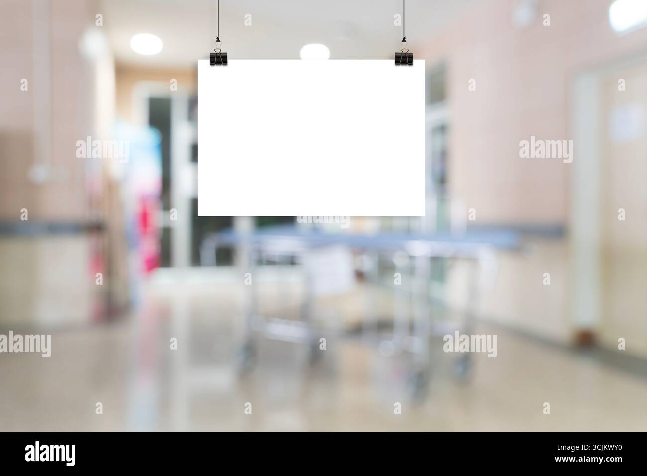 Blank white poster mockup hanging with clips in hospital or office ...