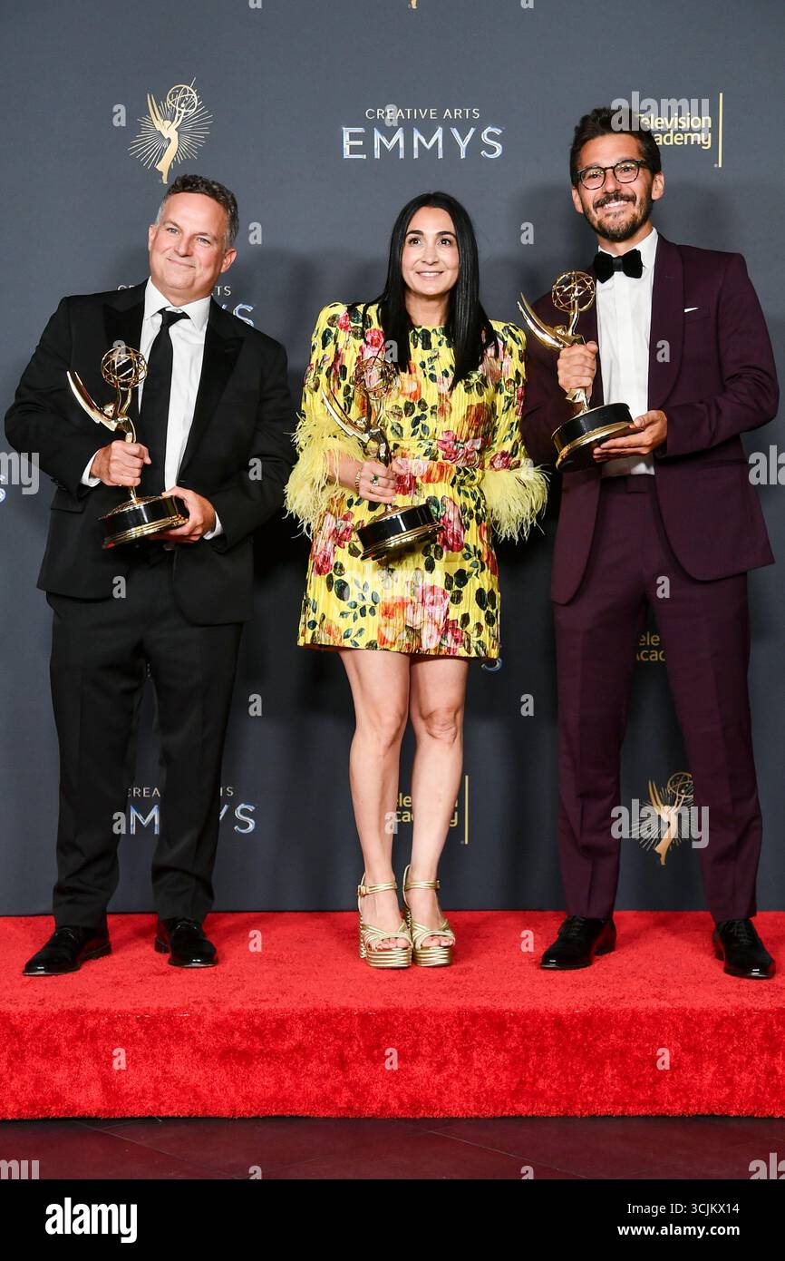 Ian Berger, from left, Jennifer Flanz, and Devin Delliquanti pose in ...
