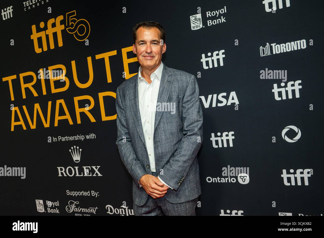 Producer Scott Stuber arrives on the red carpet for the TIFF Tribute ...