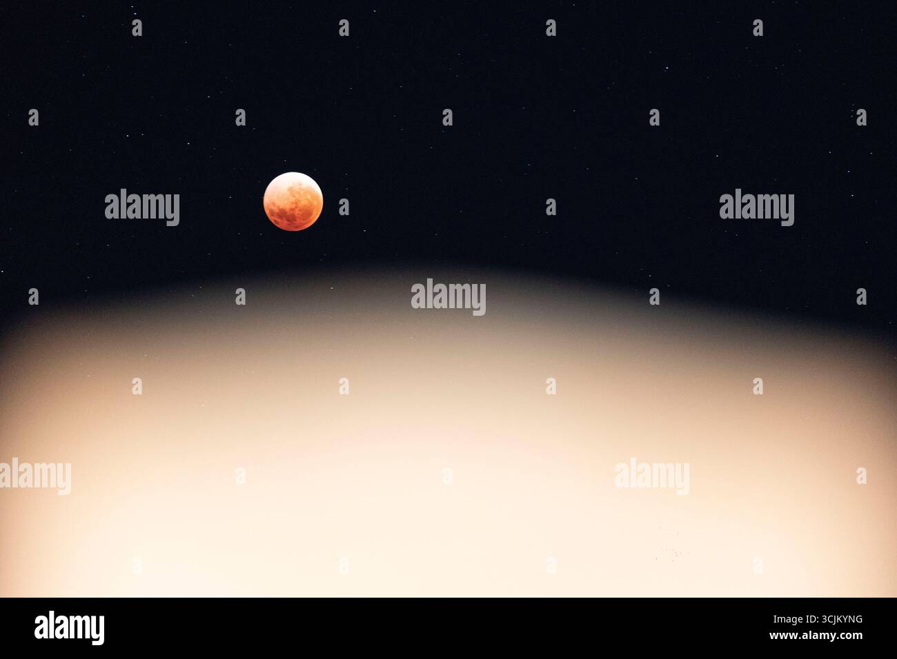 A total lunar eclipse is seen over Victoria, turning the Moon a deep red. A total lunar eclipse ...