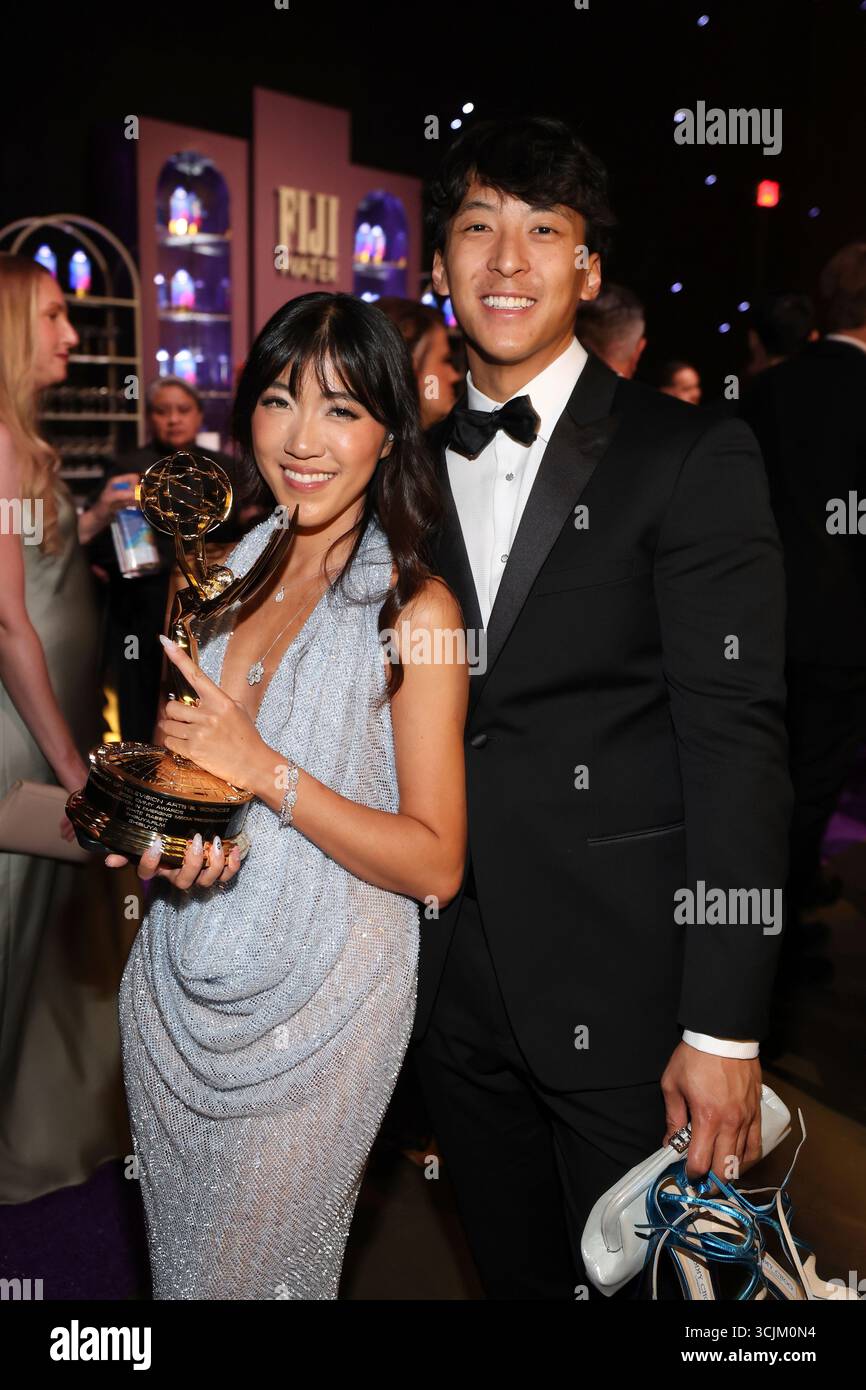 EXCLUSIVE - Emily Yang, left, and Daniel Park with the Emmy for Emmy ...