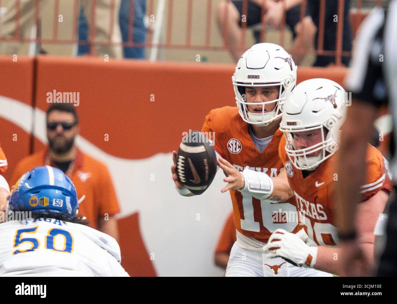 Texas quarterback Arch Manning takes the snap during an NCAA college ...