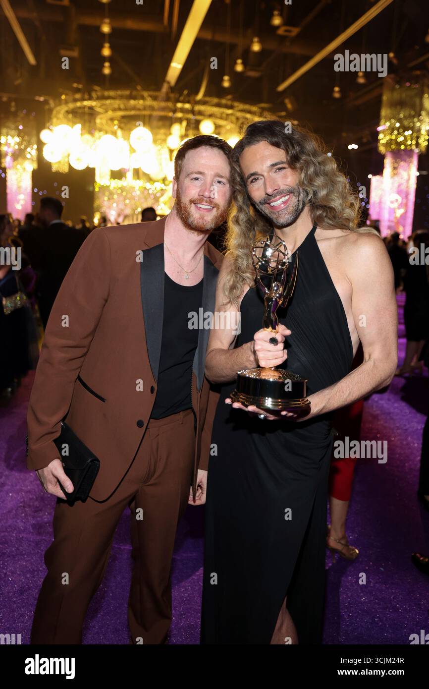 EXCLUSIVE - Mark Peacock, left, and Jonathan van Ness with the Emmy for ...