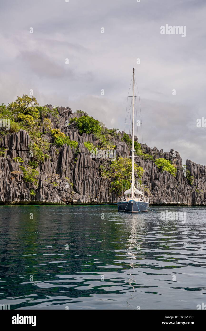 Coron, Palawan, Philippines - JANUARY 10, 2024: A sailboat next to the ...