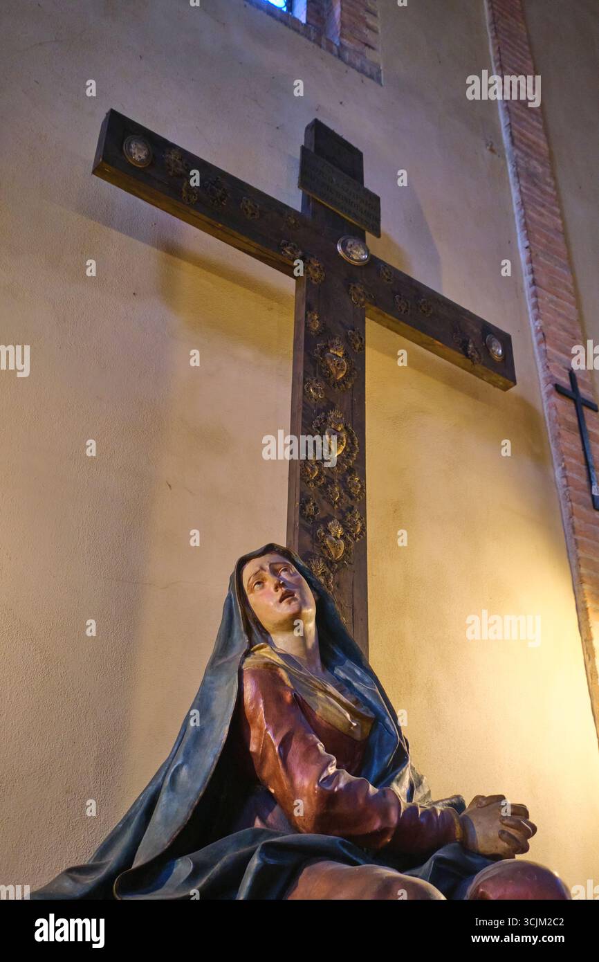 A wood carved, painted sculpture of the Virgin Mary with cross, a pieta ...