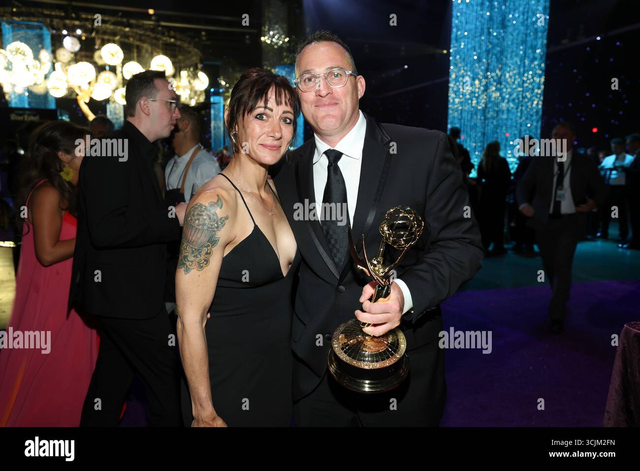 EXCLUSIVE - Kelly Mills, left, and Dmitri Makarov, with the Emmy for Outstanding Sound Editing ...