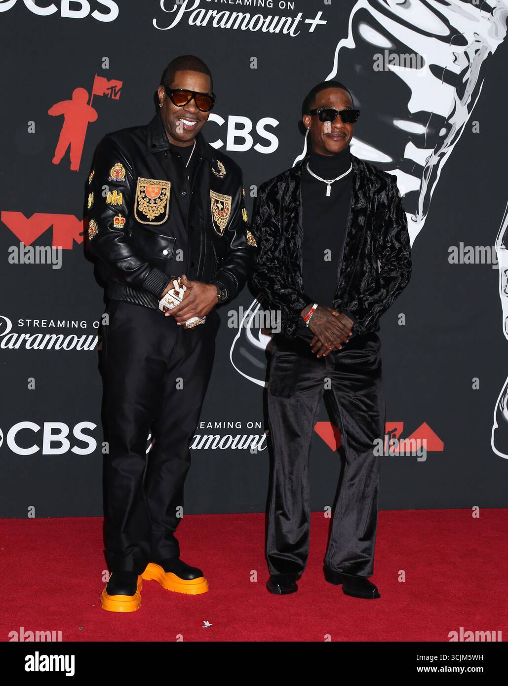 Busta Rhymes and Trilian Wood-Smith arriving at the 2025 MTV Video ...