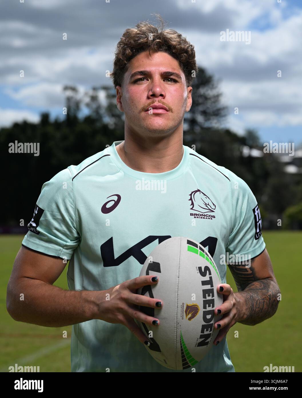 Reece Walsh of the Brisbane Broncos is seen posing for a photograph ...