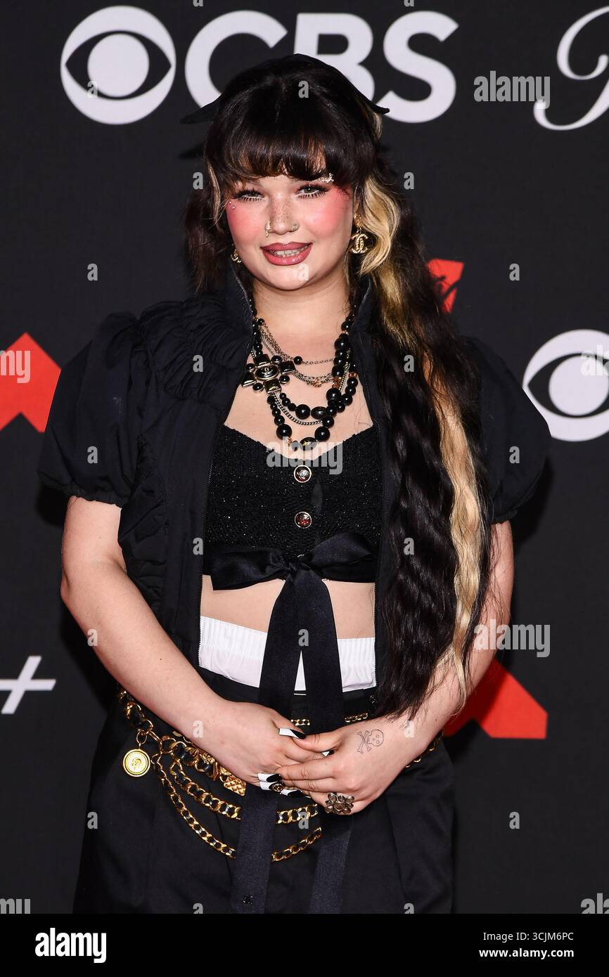 Lola Young walking on the red carpet at the 2025 MTV Video Music Awards ...