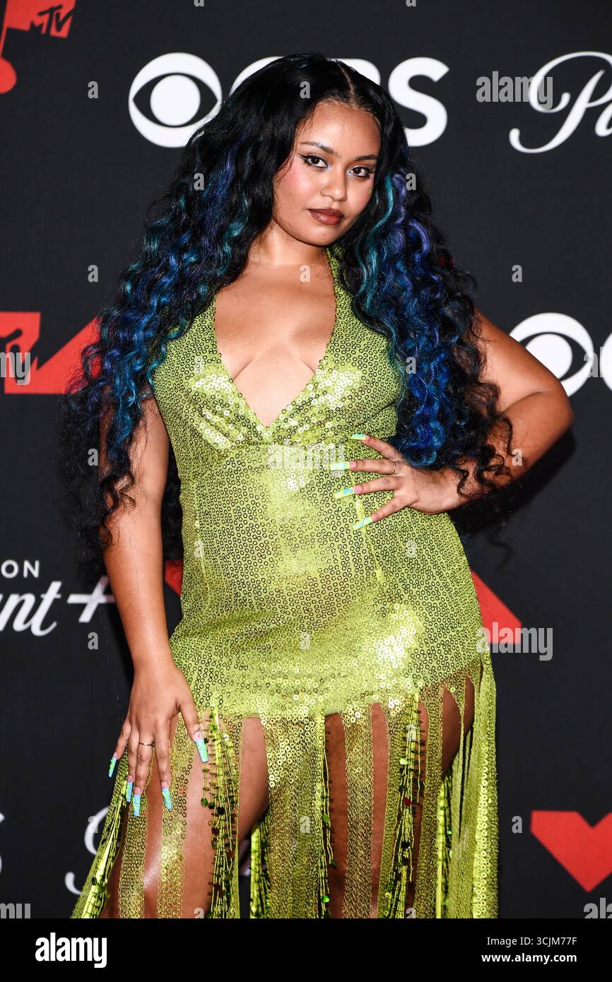 Moliy walking on the red carpet at the 2025 MTV Video Music Awards held ...