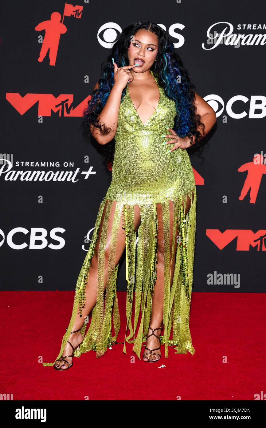 Moliy walking on the red carpet at the 2025 MTV Video Music Awards held ...