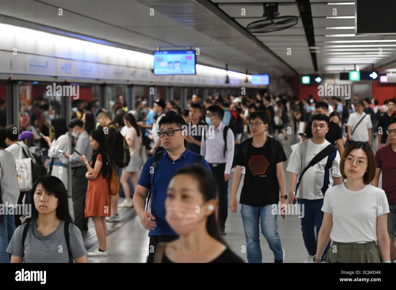 People back to work location by MTR during Typhoon Tapah run away on ...