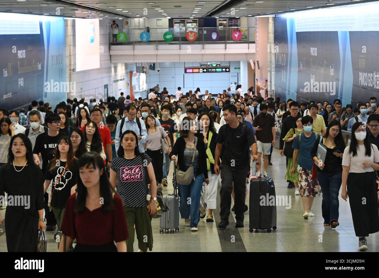 People back to work location by MTR during Typhoon Tapah run away on ...
