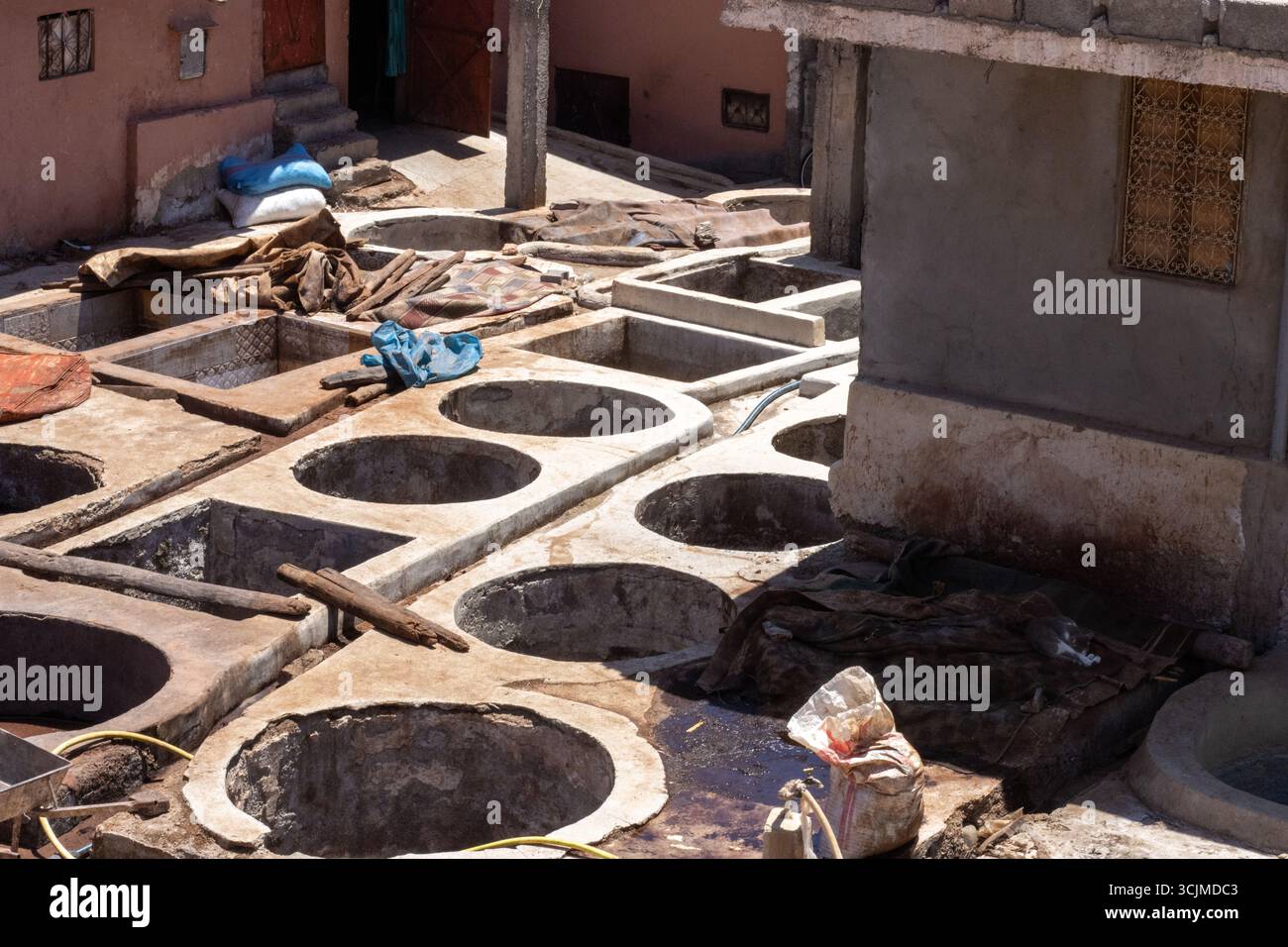 Walls of the city and typical leather tannerie in Marrakesh, Morocco ...
