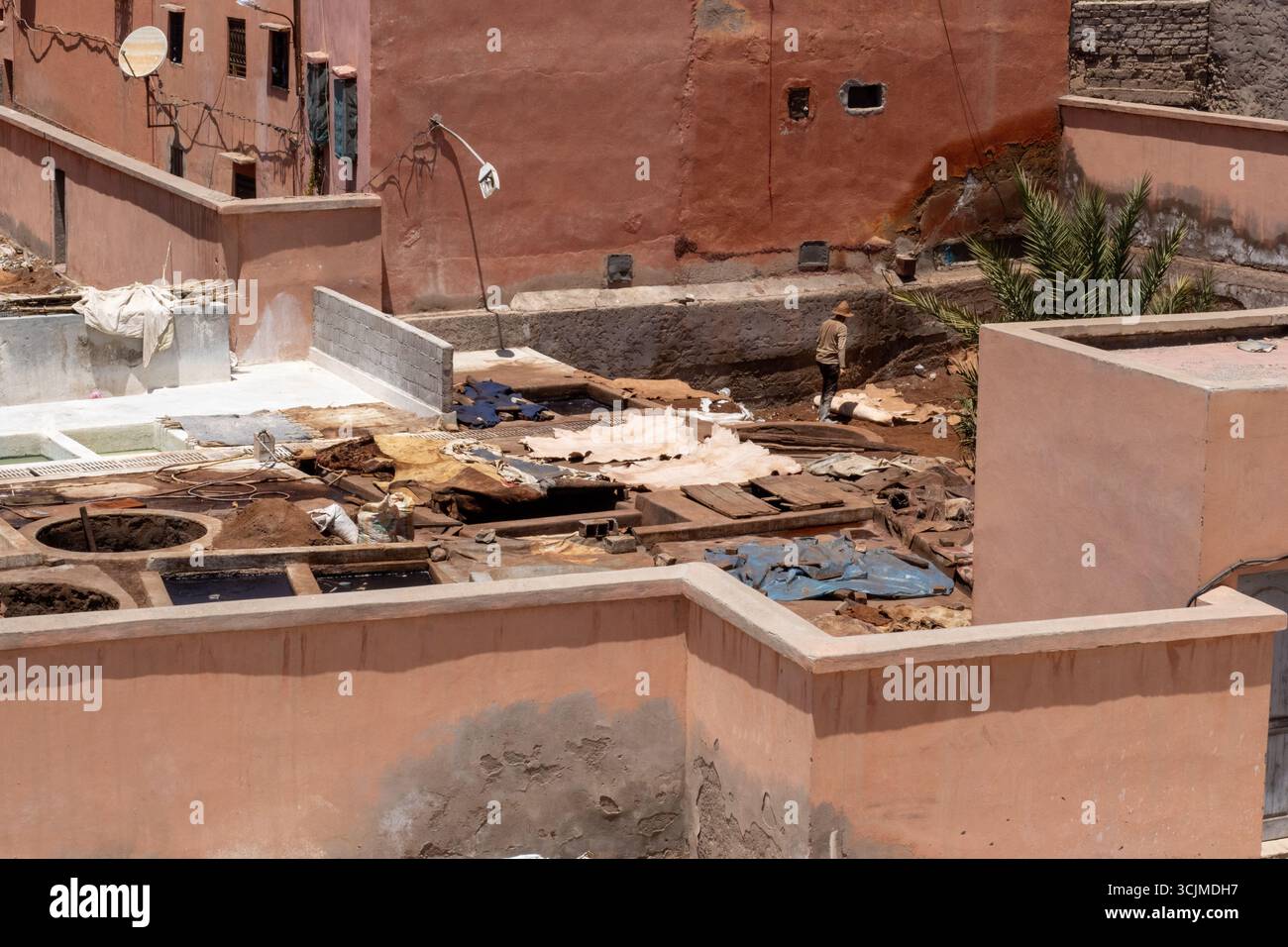 Walls of the city and typical leather tannerie in Marrakesh, Morocco ...
