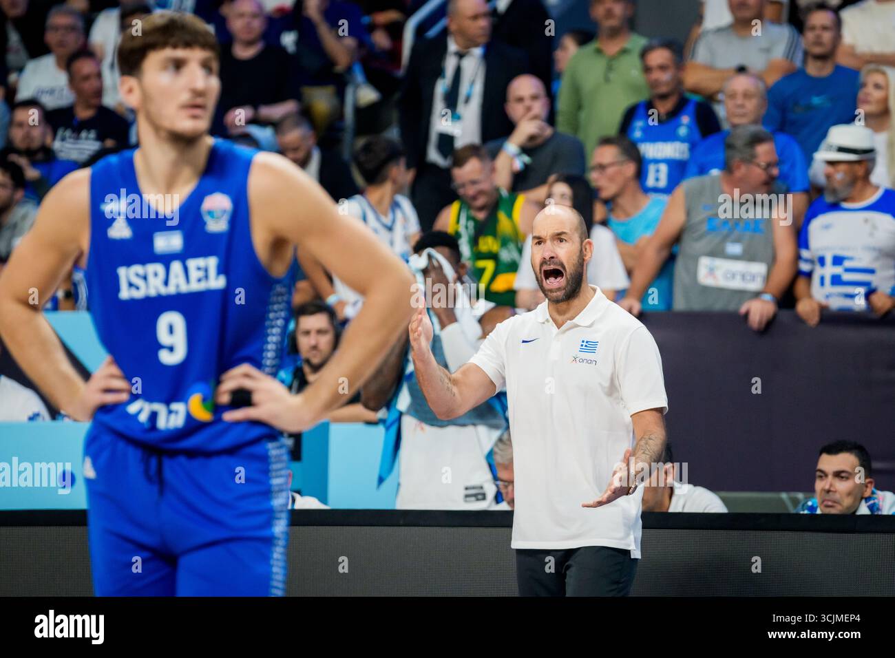 RIGA, LATVIA. 7th September 2025. Vasileios Spanoulis (R), head coach ...