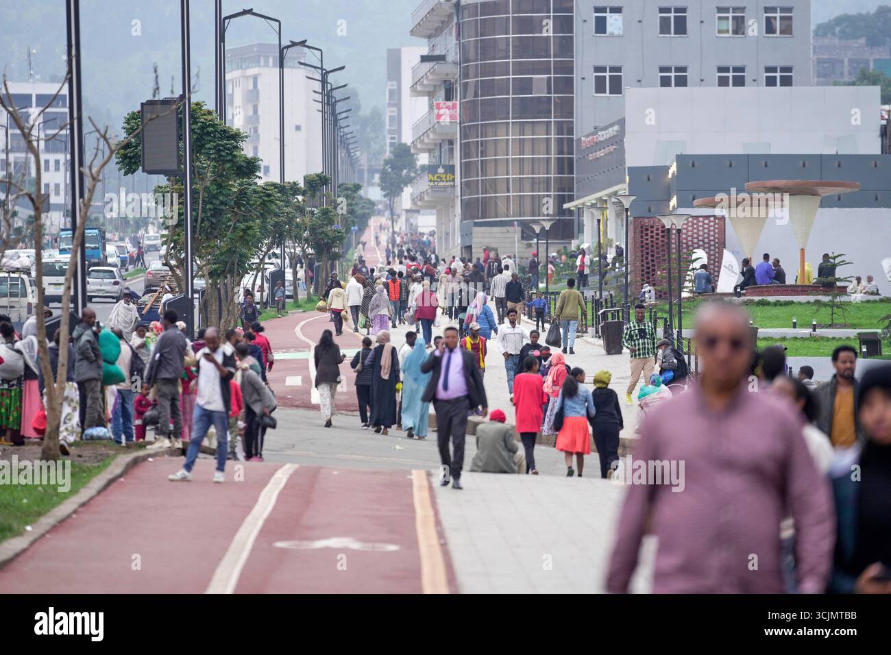 People walk on the street of Addis Ababa, Ethiopia Saturday, Sept. 6 ...