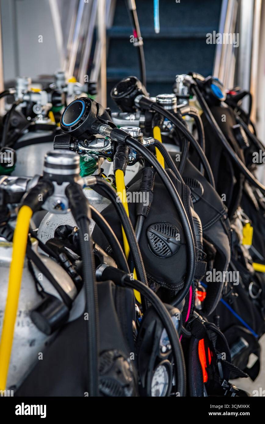 Scuba diving gear attached to oxygen tanks ready for diving Stock Photo ...