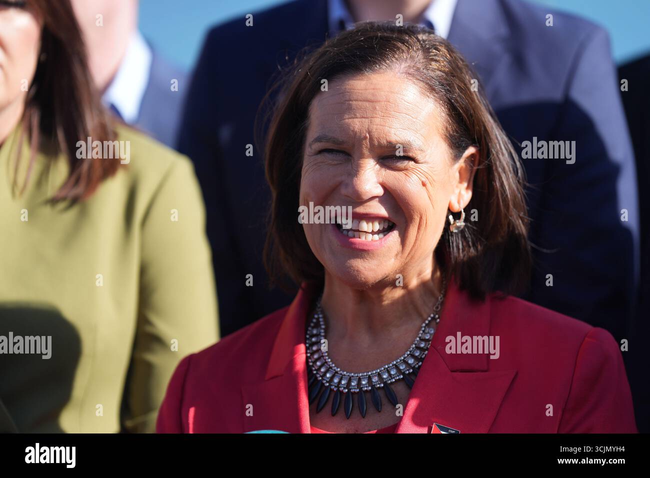 Sinn Fein leader Mary Lou McDonald, with her Oireachtas team, speaks to ...