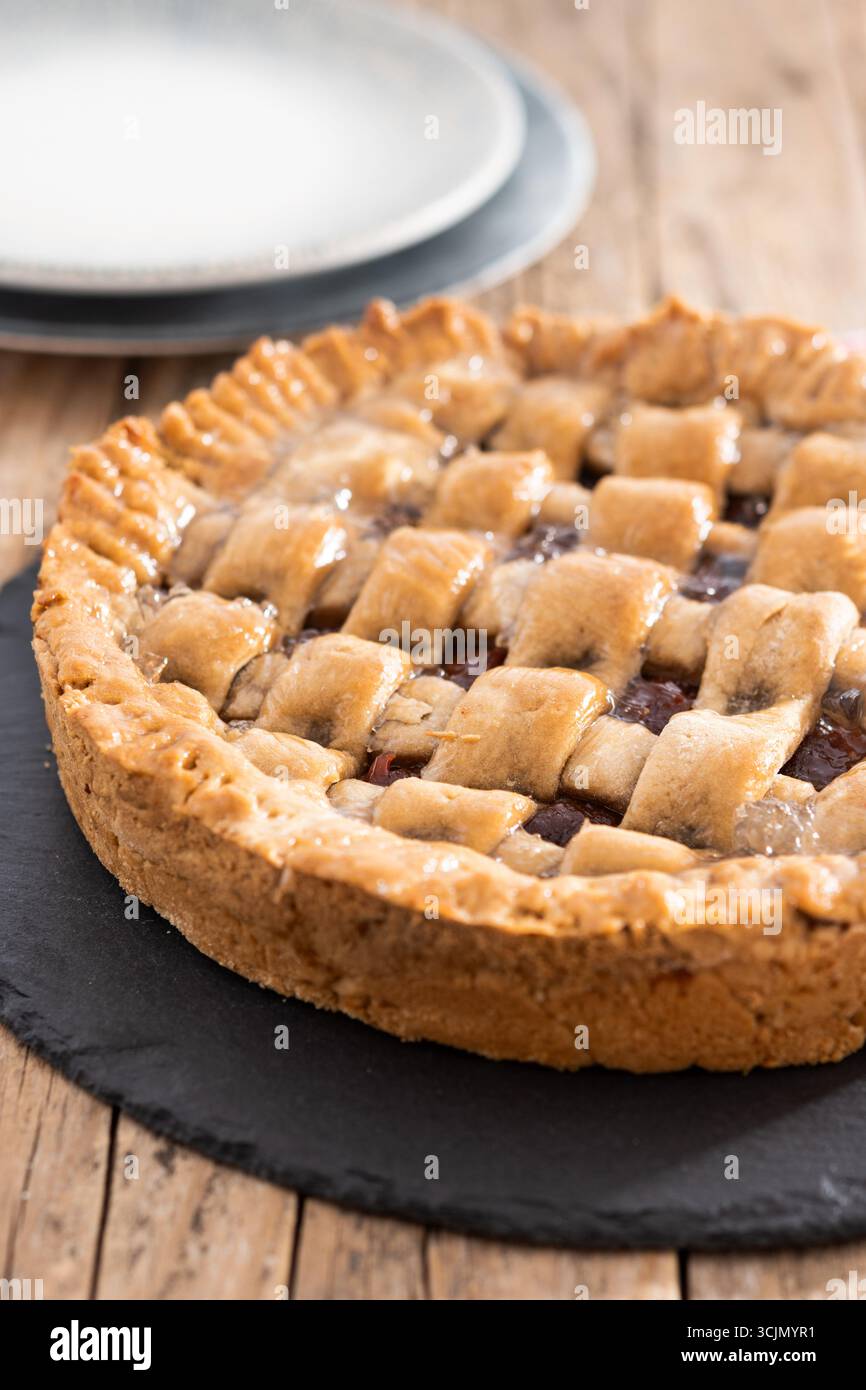 Slice of traditional Pastafrola pie with guava filling, also known as ...