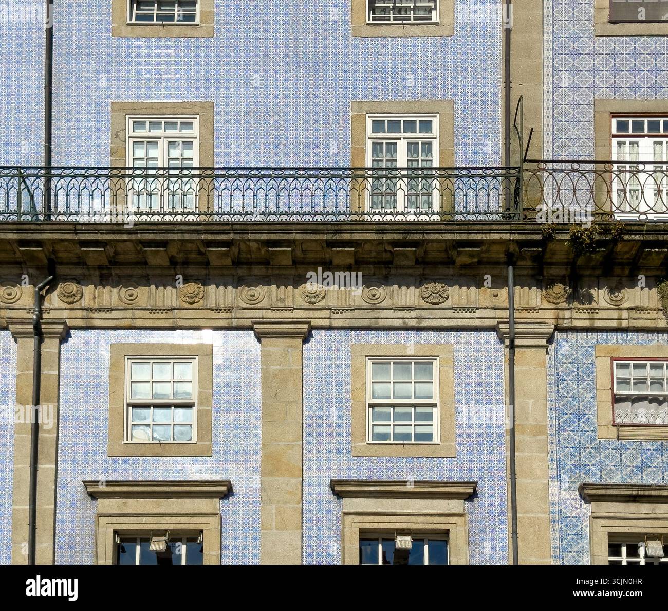 traditional Portuguese building facade decorated with blue azulejo ...