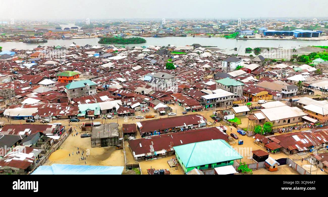 Aerial view of tightly packed buildings with corrugated iron roofs ...