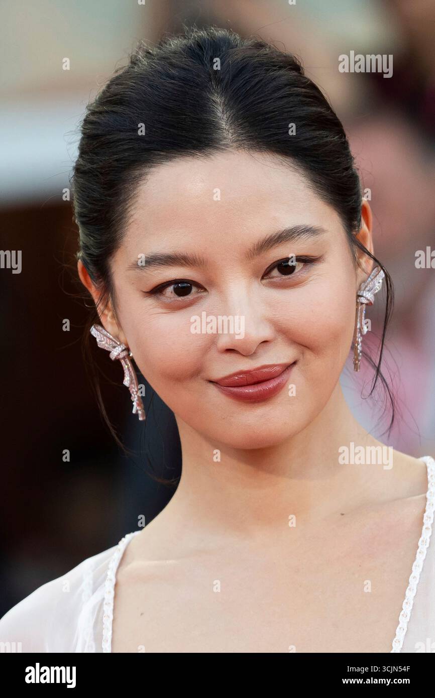 Xin Zhilei poses for photographers upon arrival at the awards ceremony of the 82nd edition of ...