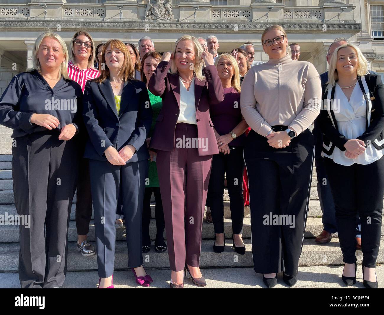 First Minister Michelle O'Neill (centre) poses for a photo with the ...
