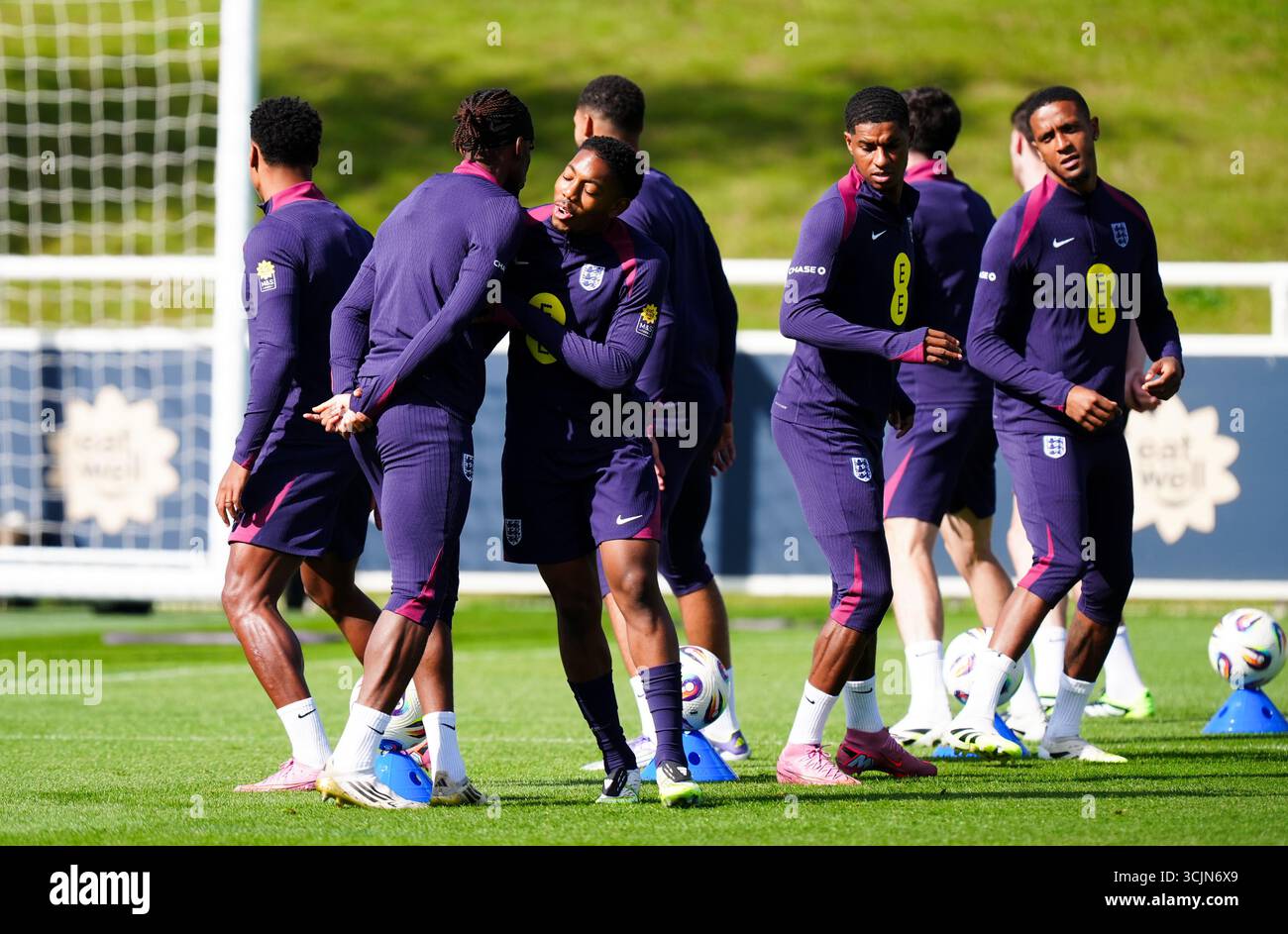 England's Noni Madueke and Myles Lewis-Skelly during a training session ...