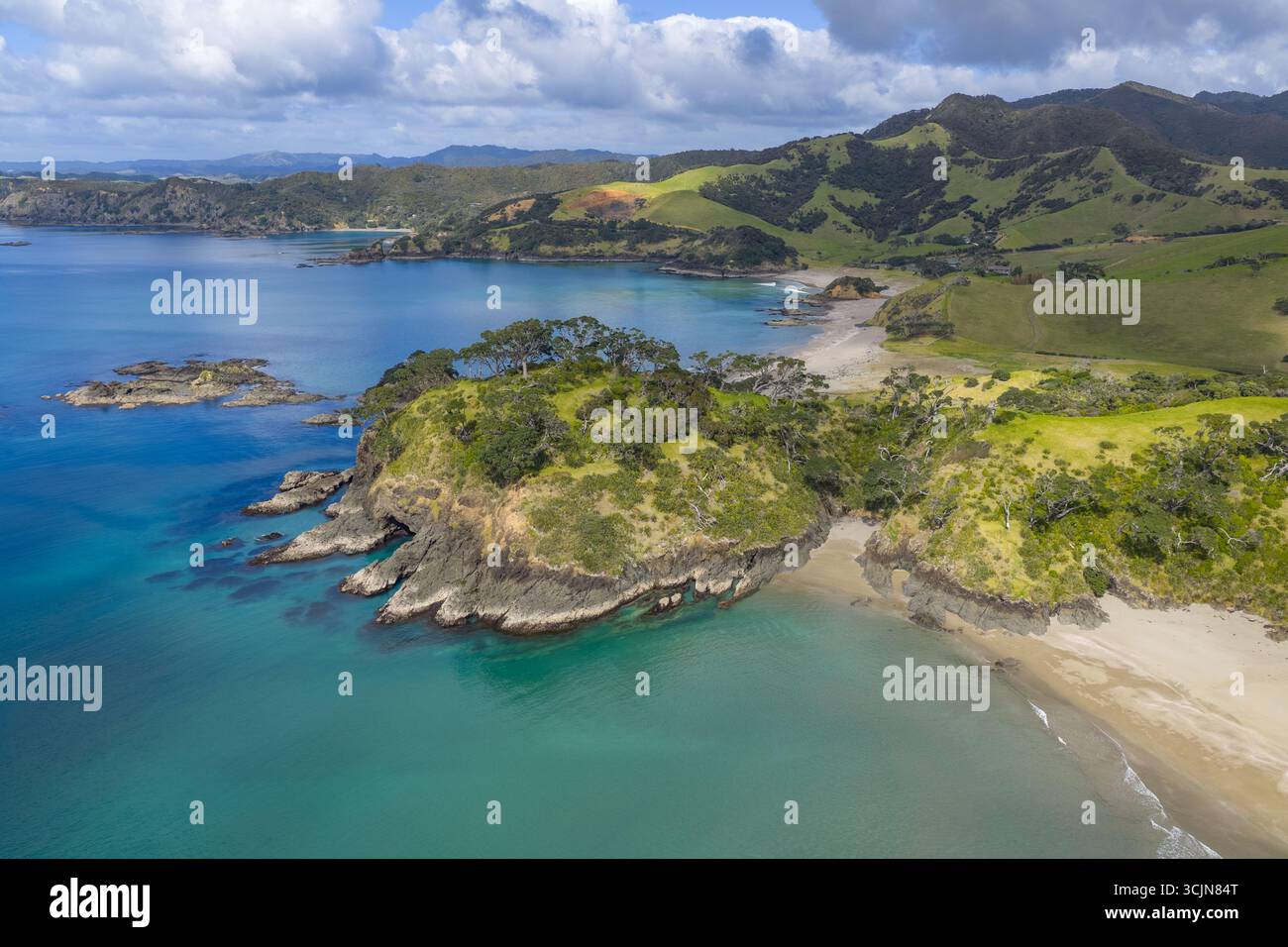 Aerial view of the rugged coastline where the turquoise waters meet the ...