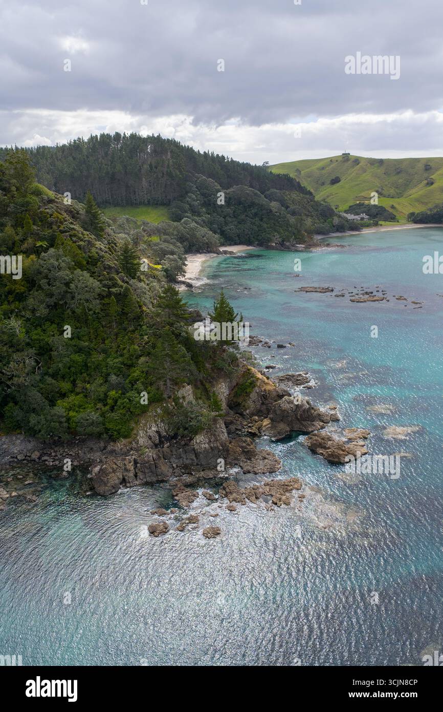 Aerial view of the rugged coastline where turquoise waters meet the ...