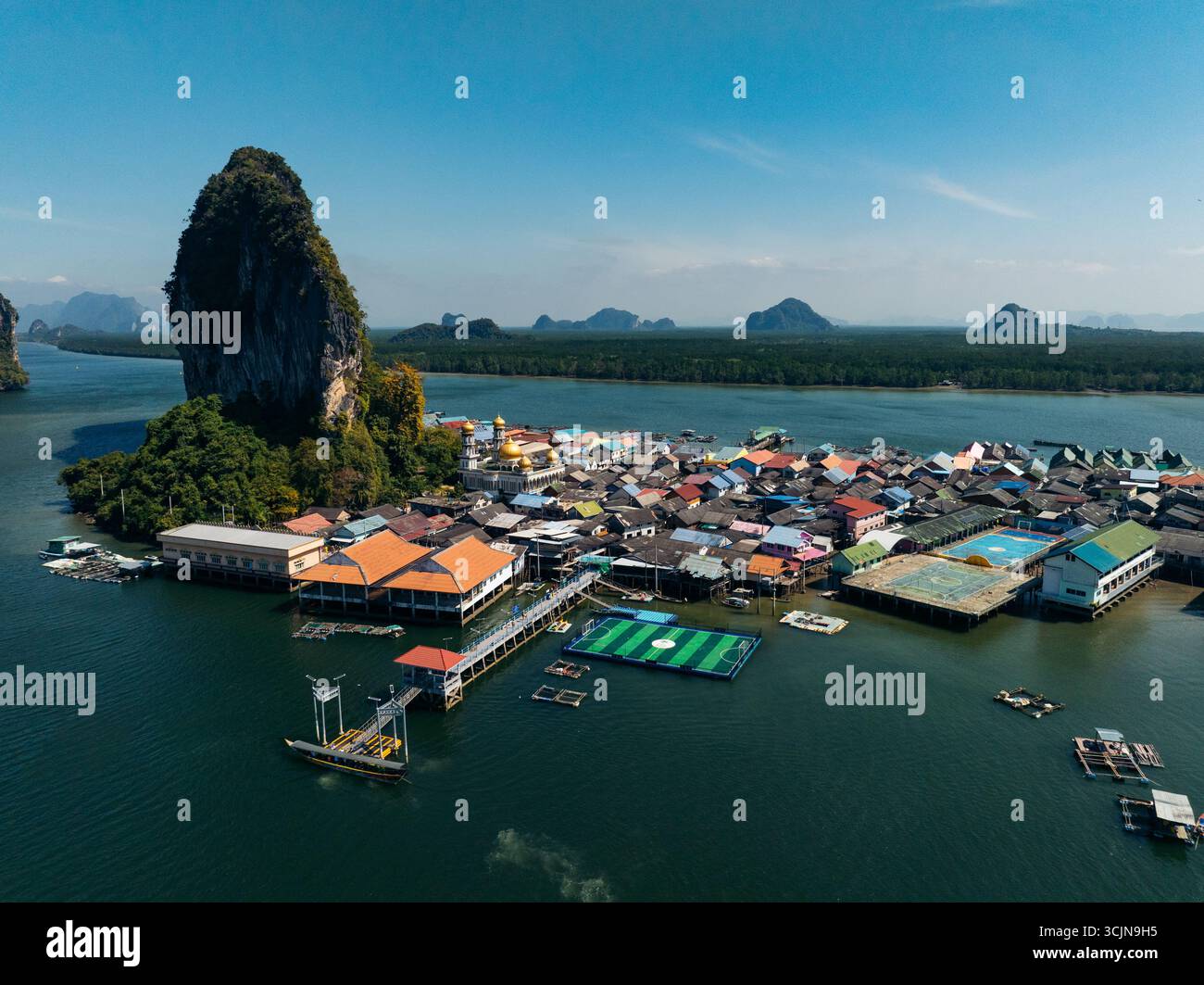 Aerial view of the vibrant floating village with its iconic football ...