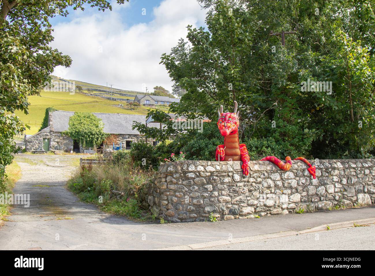 Llwyngwril, UK. 1st September, 2025. Knitted red dragons appear in the ...