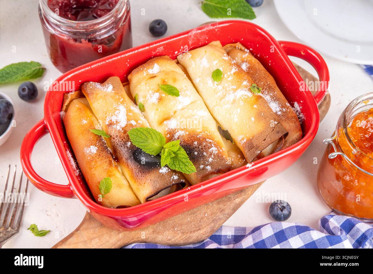 Traditional German Pfannkuchen-Auflauf, baked pancakes casserole. Sweet ...