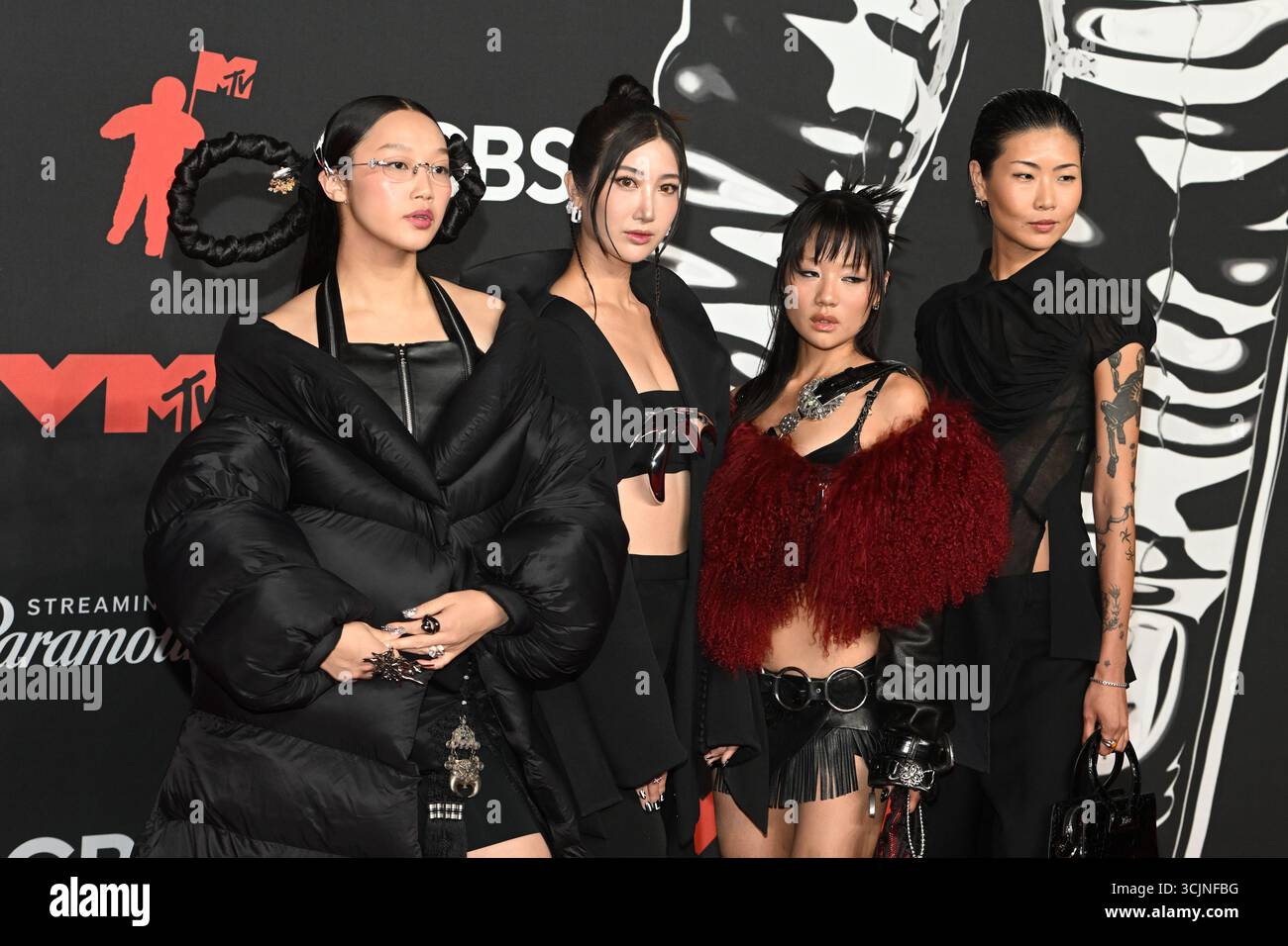 Audrey Nuna, EJAE, and Rei Ami of HUNTR/X, and May Hong attend the 2025 ...