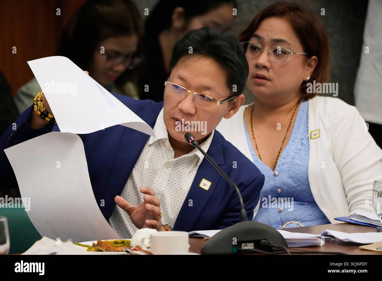 Private contractors Pacifico Discaya. left, and wife Sarah show ...