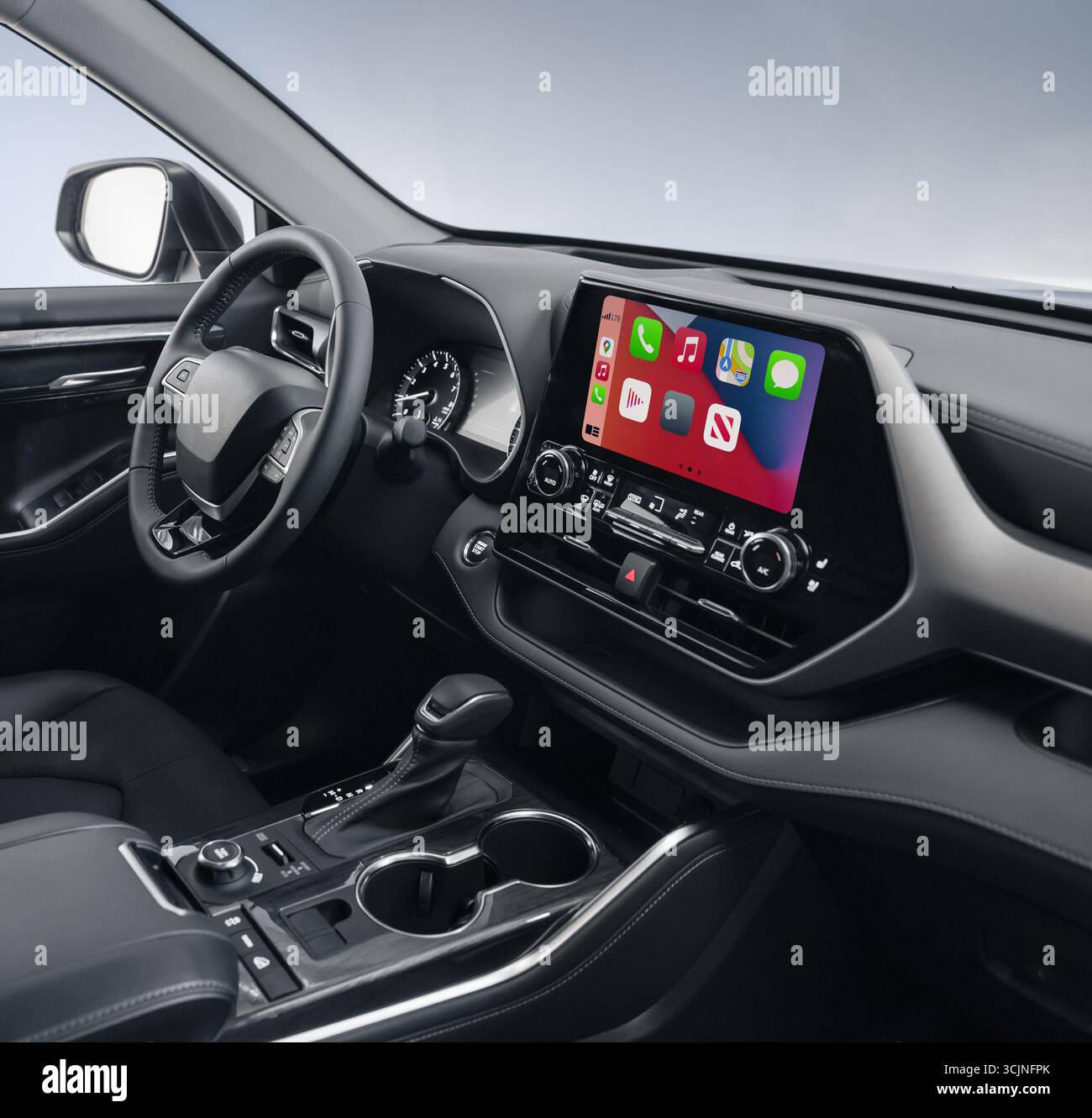 Front panel of modern vehicle, close-up shot of infotainment system ...