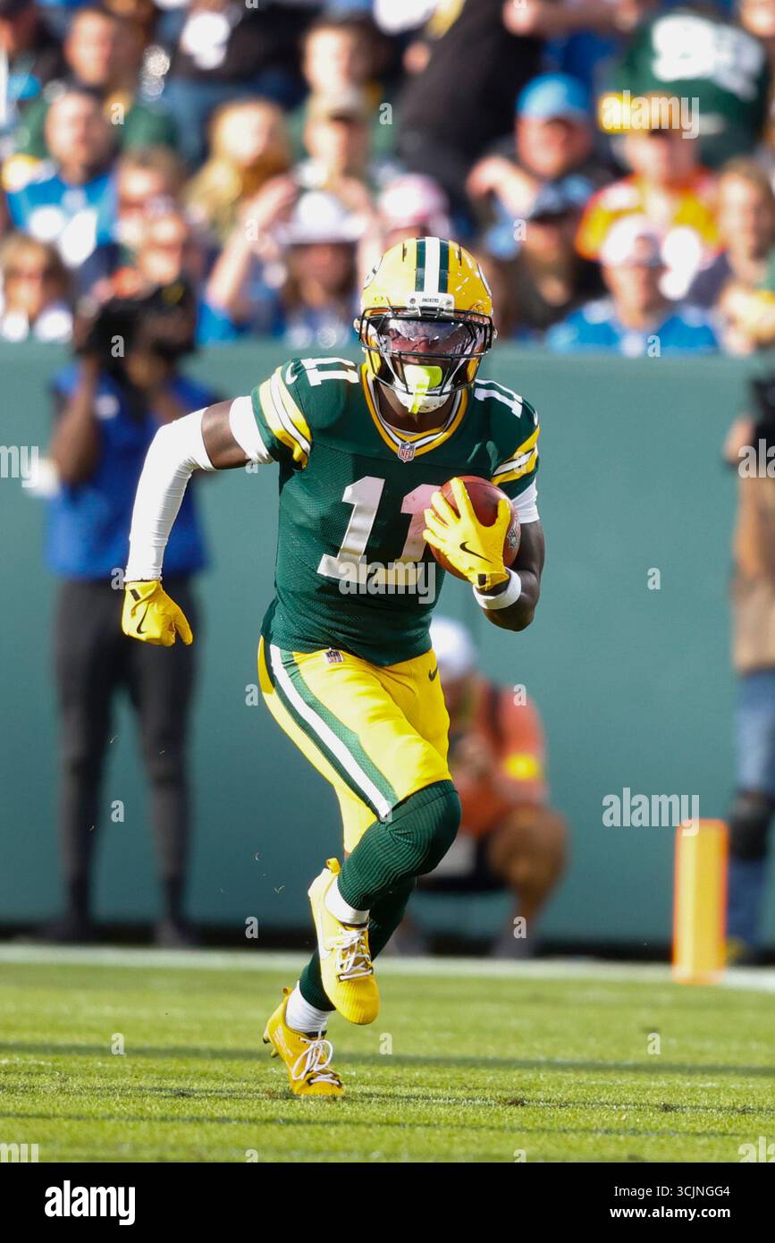 Green Bay Packers wide receiver Jayden Reed (11) runs the ball during a ...