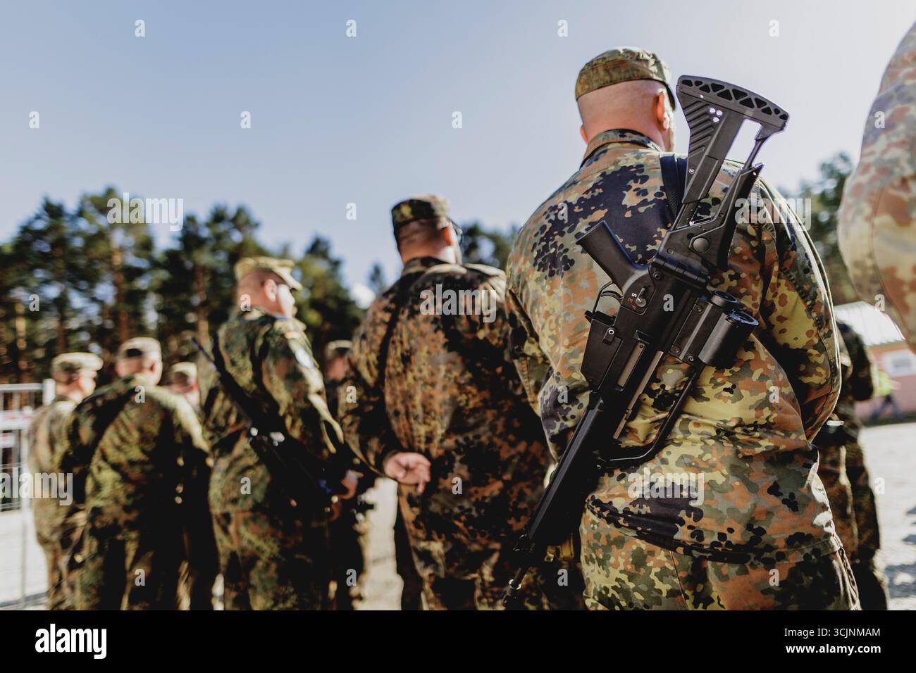 Soldiers stand together with G36 rifles, pictured in the temporarily ...