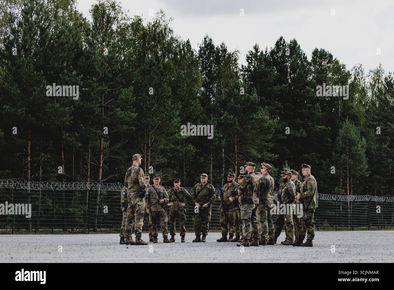 Soldiers stand together, pictured in the temporarily erected Convoy ...