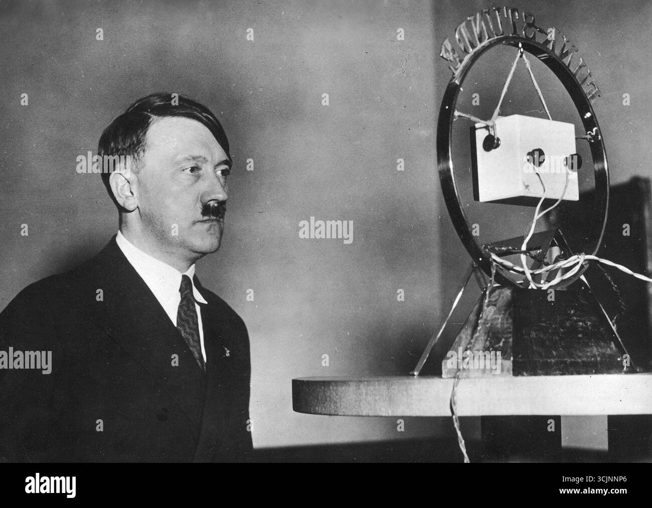 Reich Chancellor Adolf Hitler radio speech, in front of the microphone, 1933 Stock Photo - Alamy